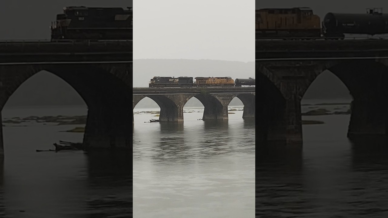 NS SD70ACE leads NS manafest over the Rockville bridge with a Union ...