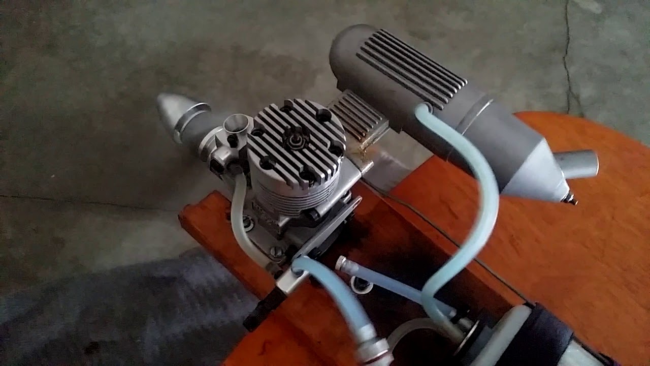 ASP XL .61 two stroke w modded carb - YouTube