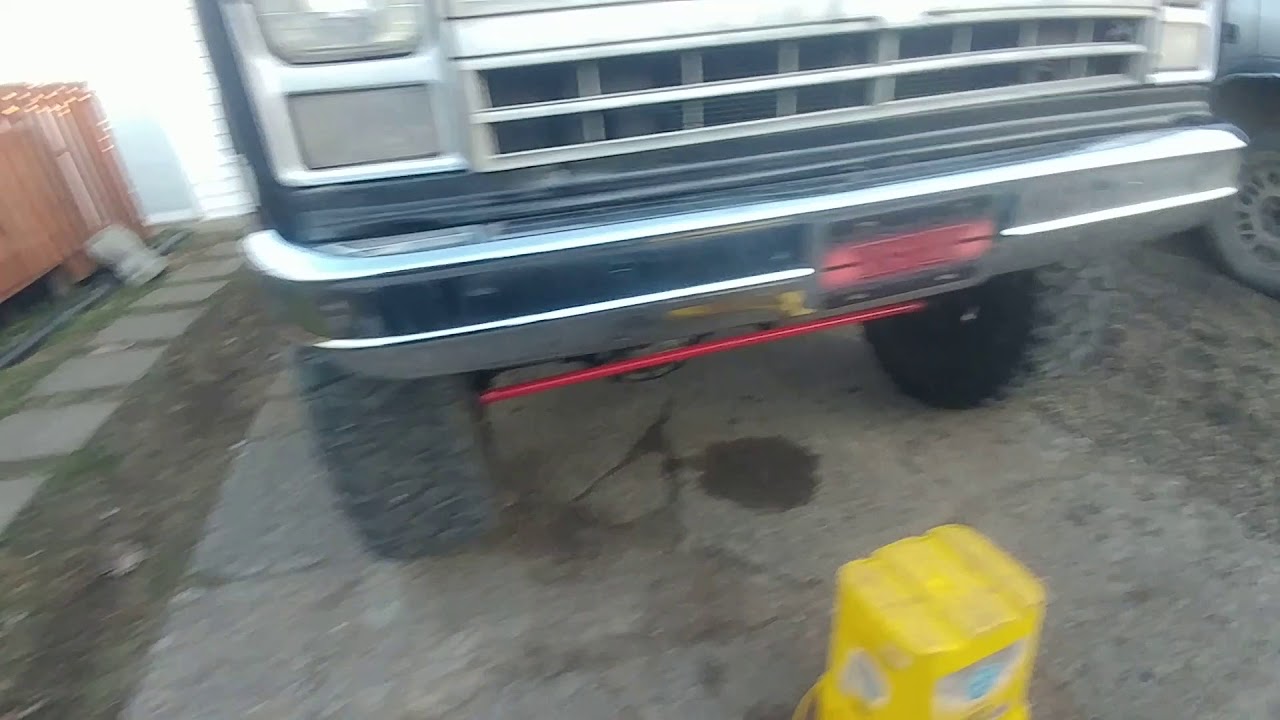 Square body chevy 8in lift on 37s walk around - YouTube