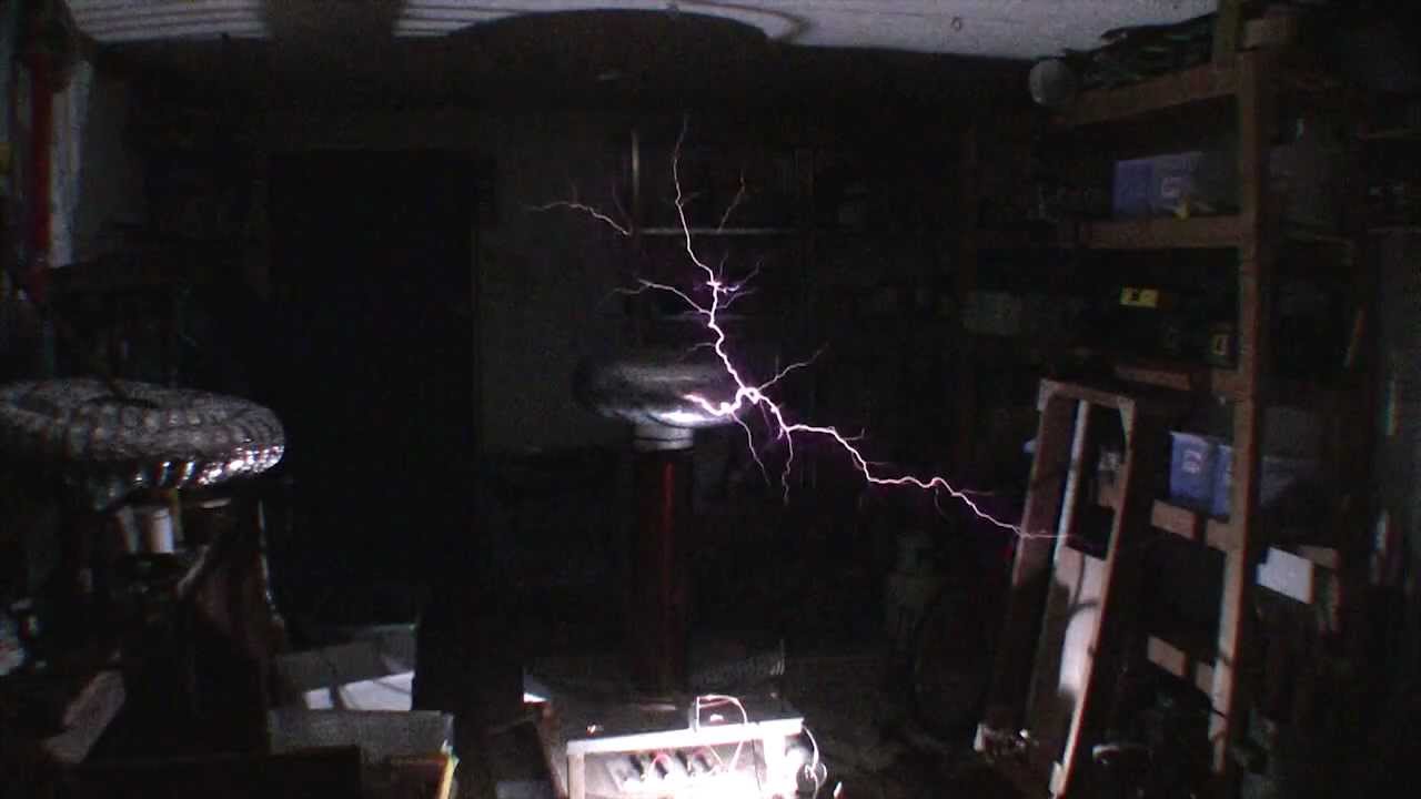 My rebuilt 6" dual MOT Tesla coil + blown light and smoking coil - YouTube