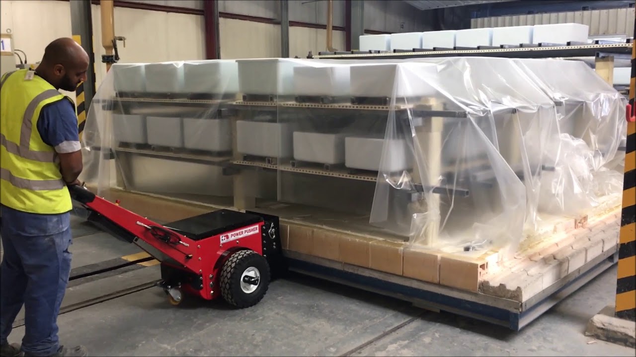 Nu-Star Power Pusher with bespoke kiln-car attachment pushing a laden ...
