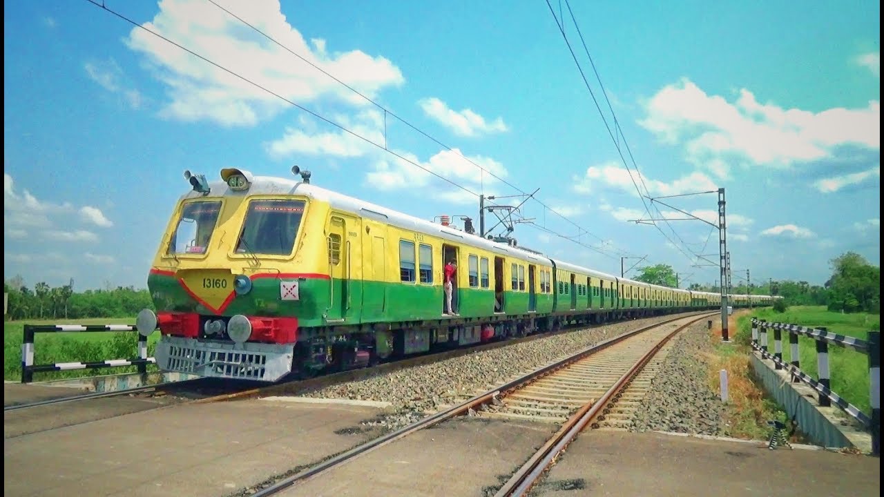 Speedy Electric Multiple Unit train passing through a huge curve ...