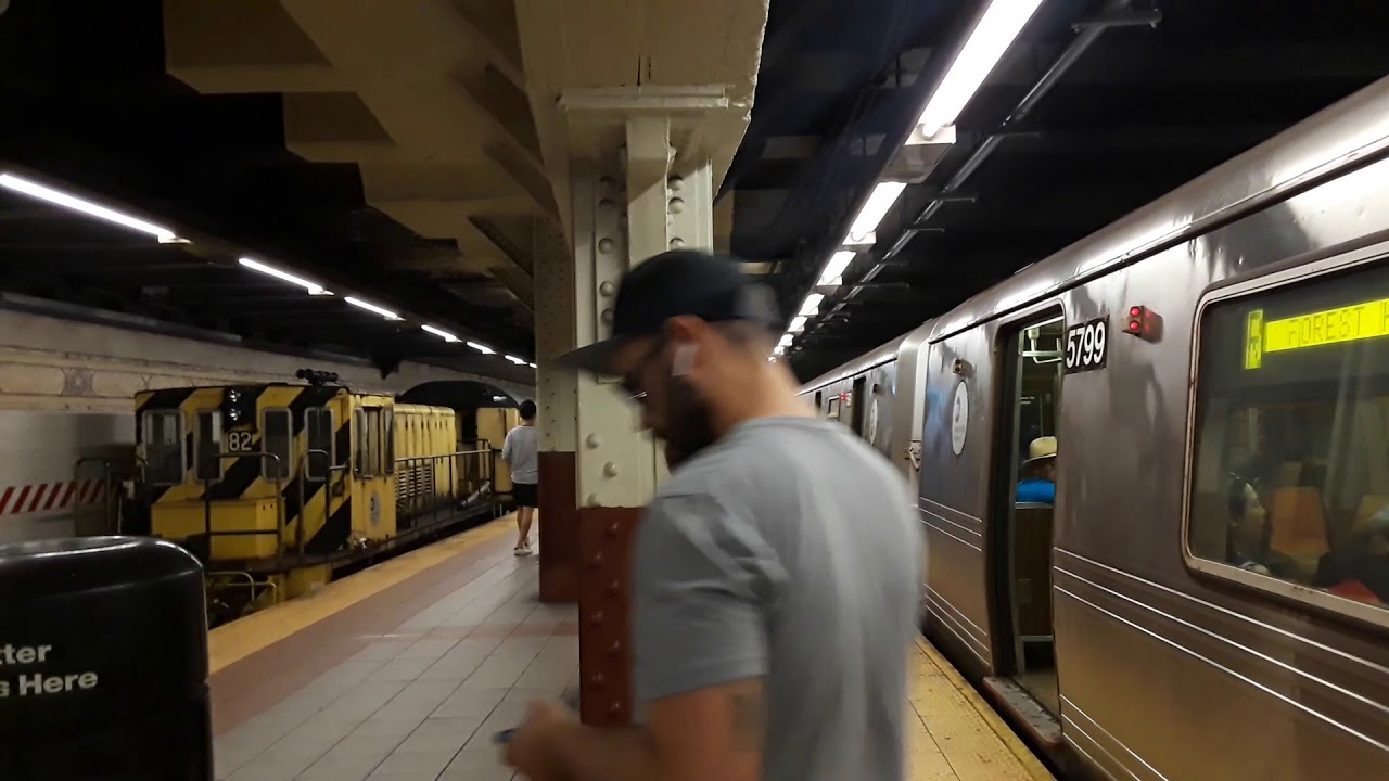 R46 #5799 (R) arriving at & leaving DeKalb Avenue [+ R52 locomotive #82 ...