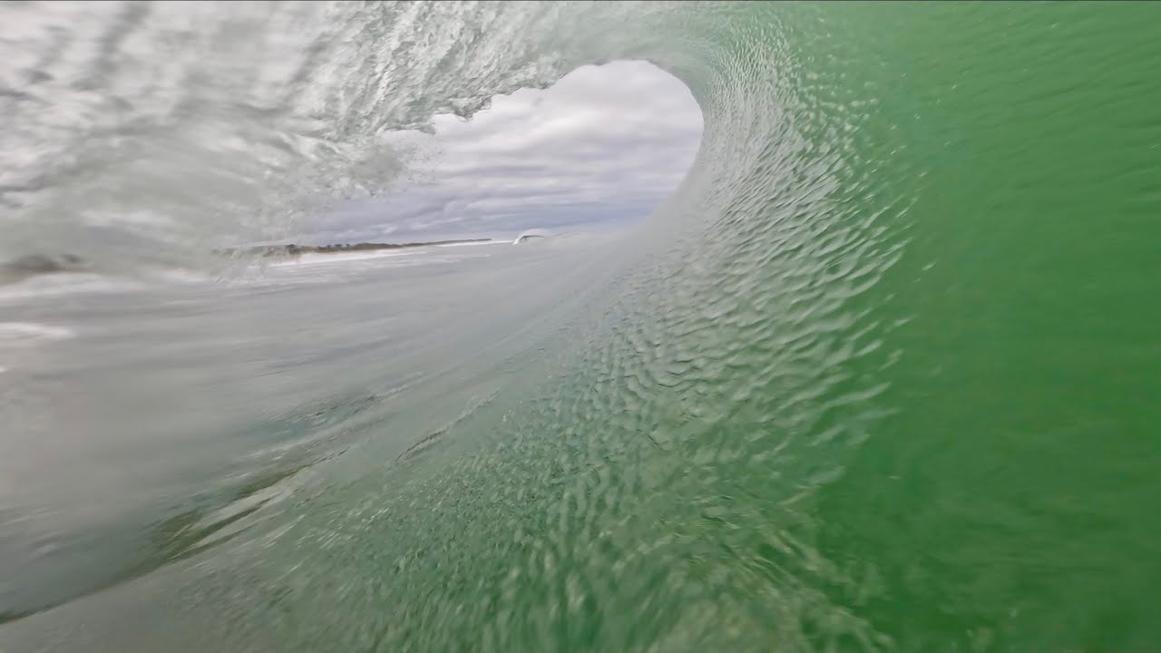 SURFING CLEAN BARRELS WITH AN INCOMING STORM! | New Zealand | RAW POV ...