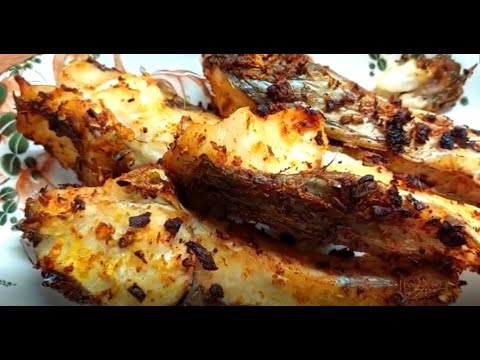 Grilled fish with galangal is crispy on the outside, soft and sweet on ...