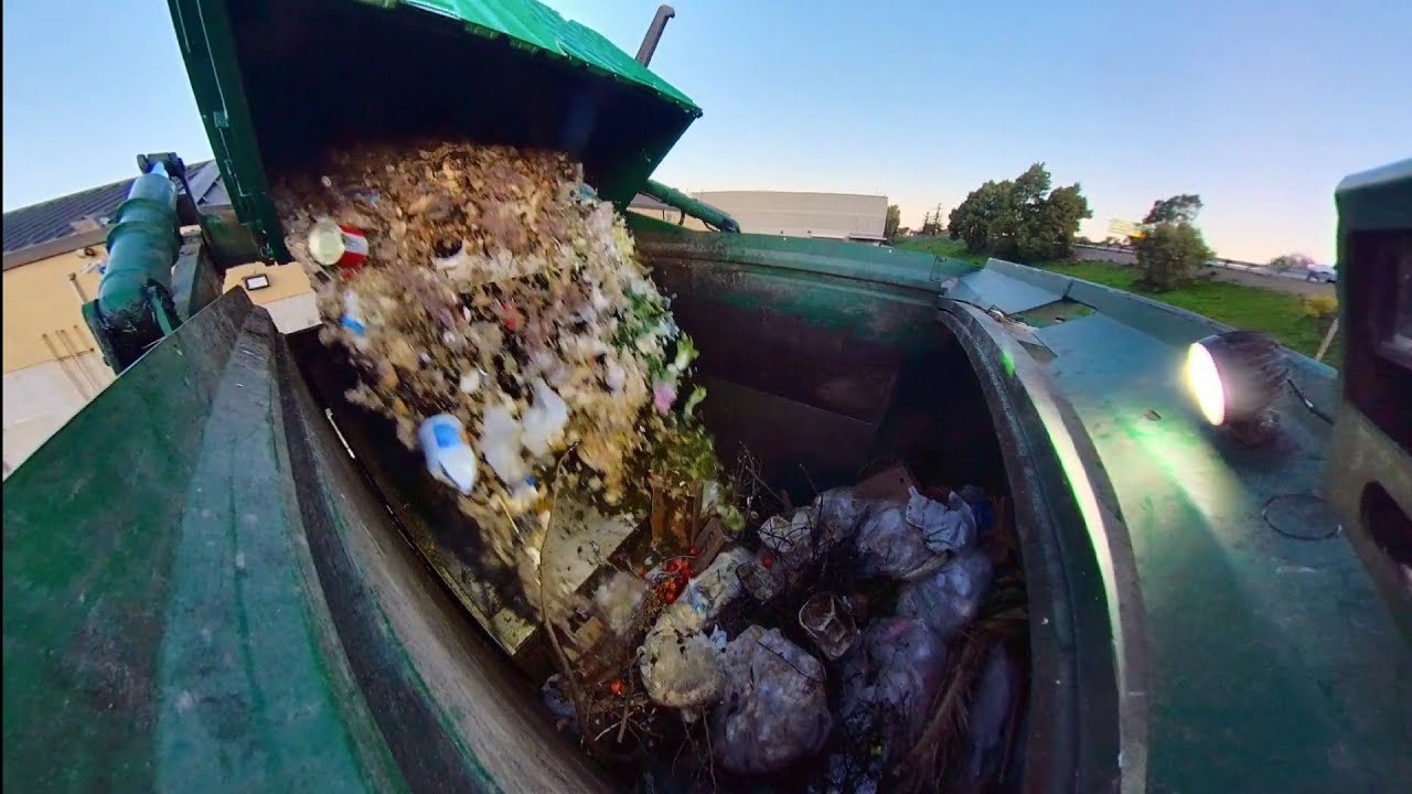 Waste Management Autocar/Heil Freedom half pack garbage truck dumping ...