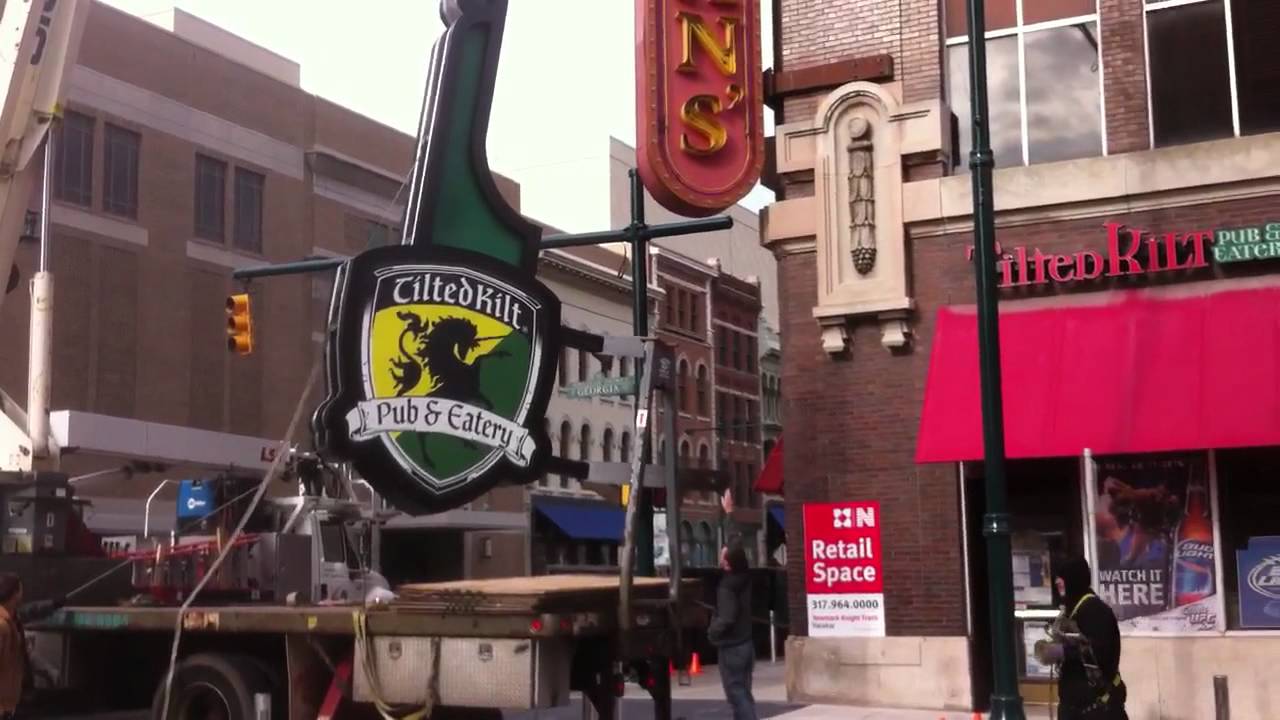 Tilted Kilt Pub & Eatery - Indianapolis: The sign is going - YouTube