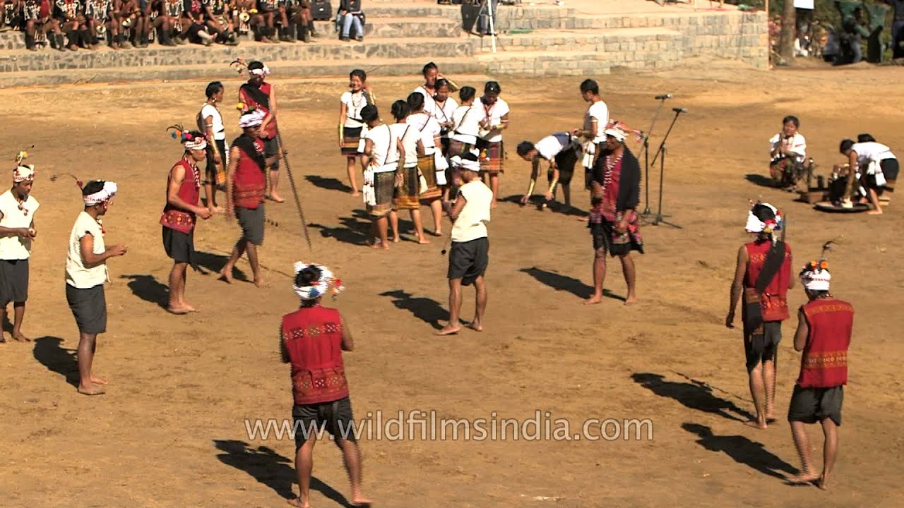 Hopscotch and top spinning traditional game diplayed by Kuki tribe ...