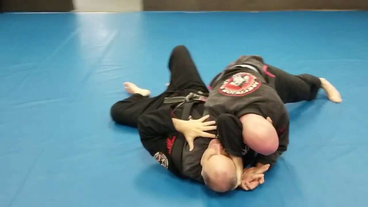 How to defend the arm triangle choke - Lesson 25A - YouTube