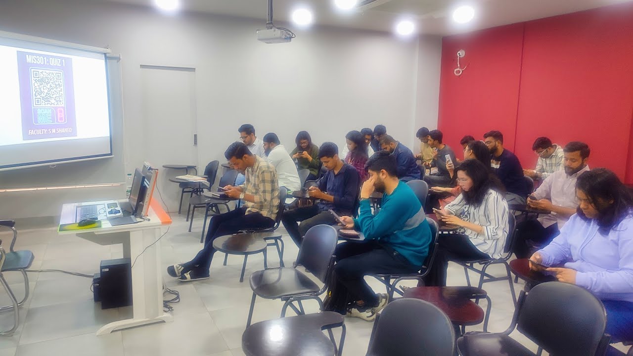 Information systems enable paperless classroom | Students scan a QR ...