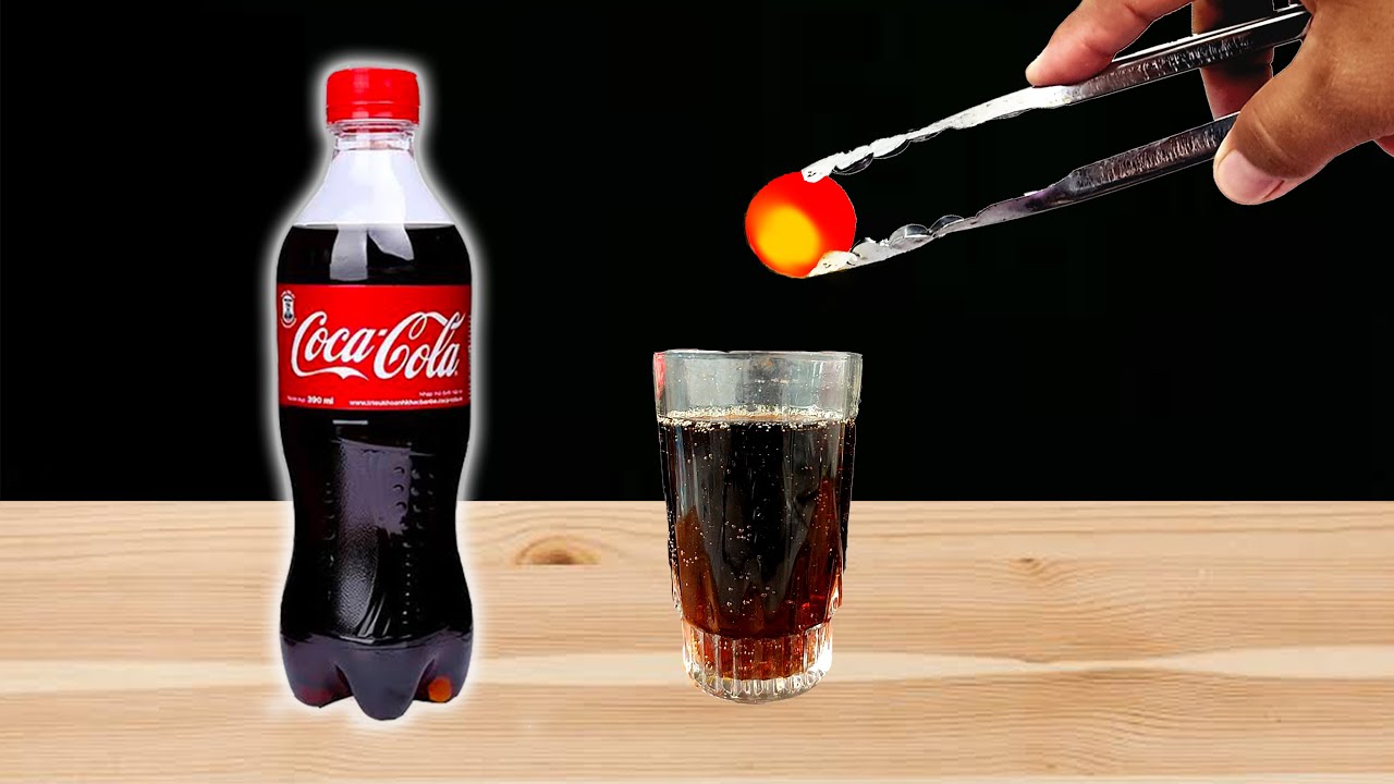 EXPERIMENT Glowing 1000 degree METAL BALL VS COCA COLA - YouTube
