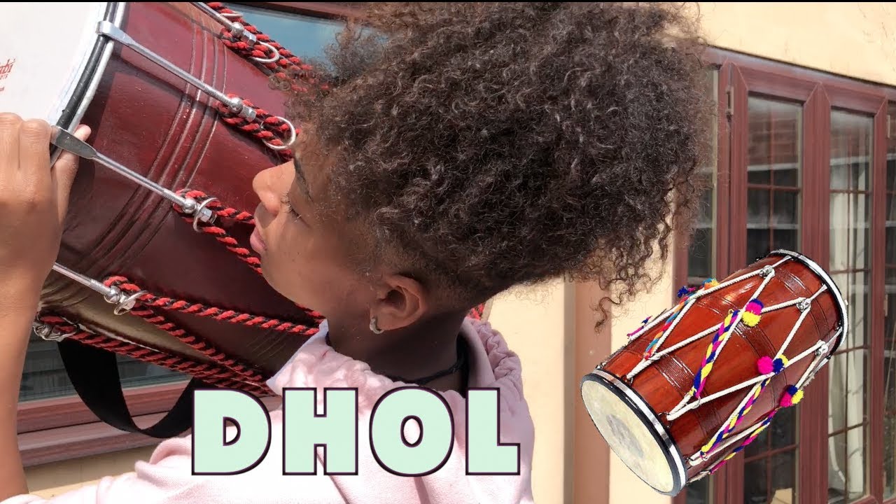 BLACK GIRL TRIES TO PLAY DHOL DRUM - YouTube