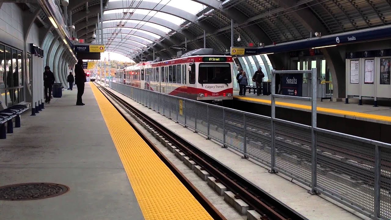 C-Train Arriving and Departing from Sunalta Station - YouTube