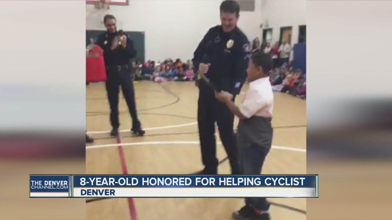 Local child called hero by Aurora Police, given award - YouTube