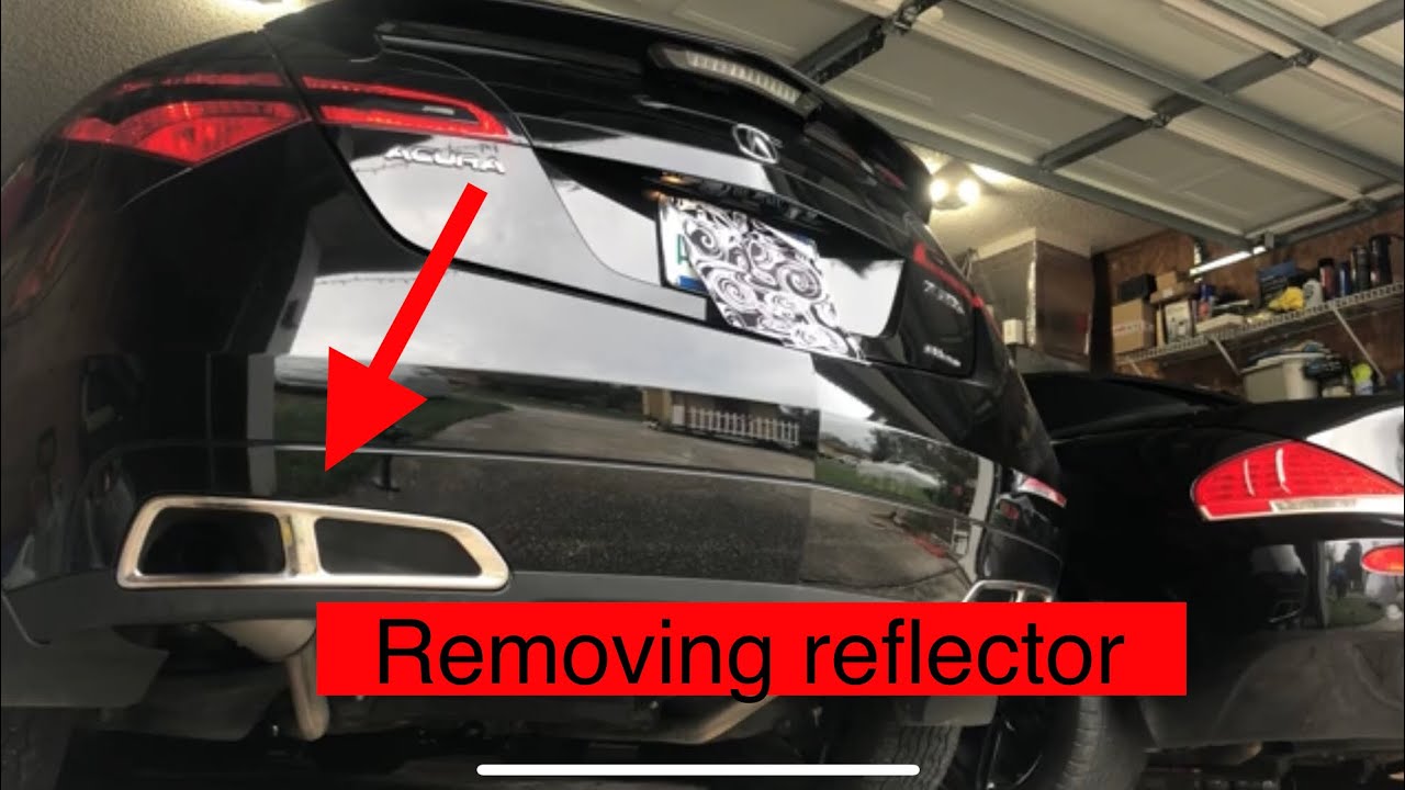 Removing Acura ZDX rear bumper reflector exhaust tip trim - YouTube