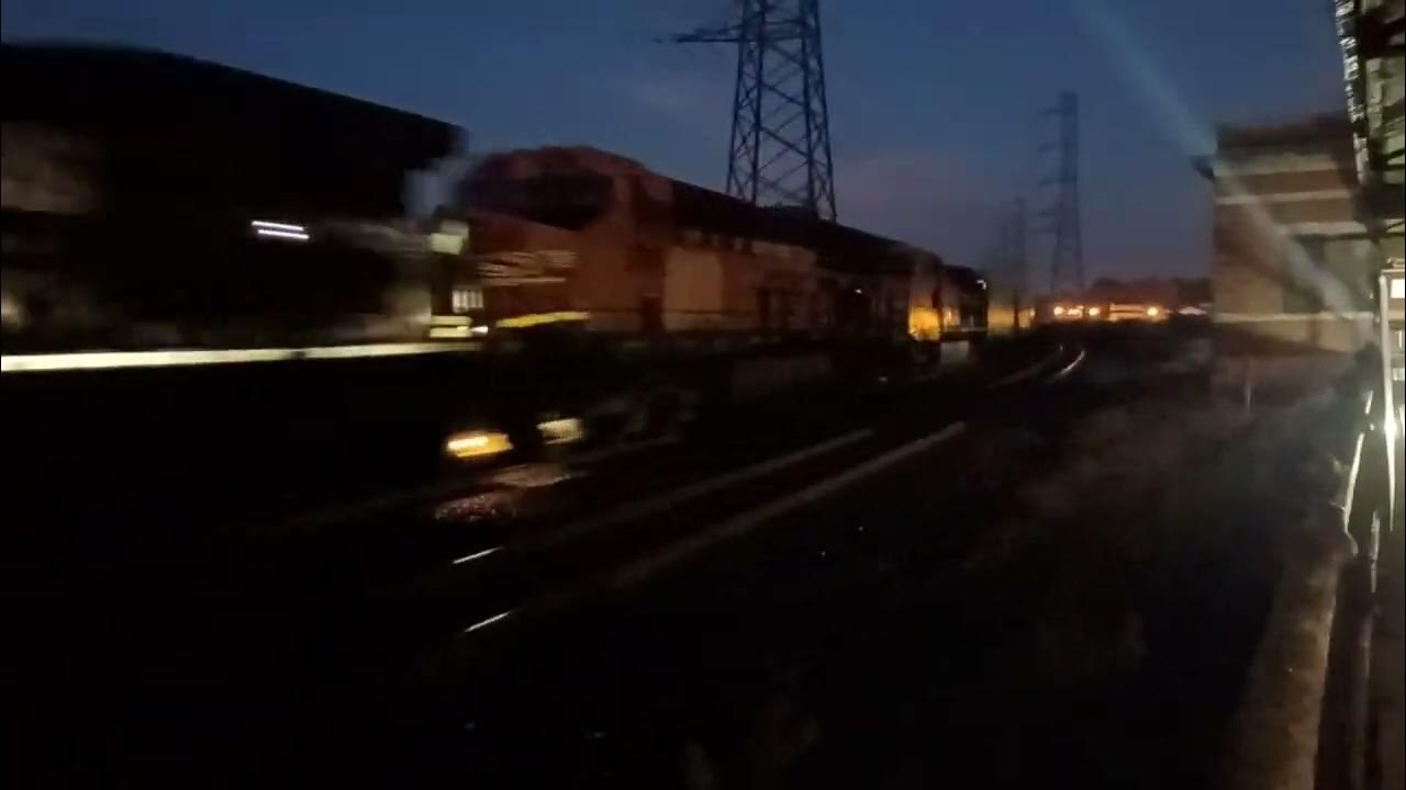 NS 22X passing by bound brook this early morning with 2 BNSFs in trail and a NS c6m leader - YouTube