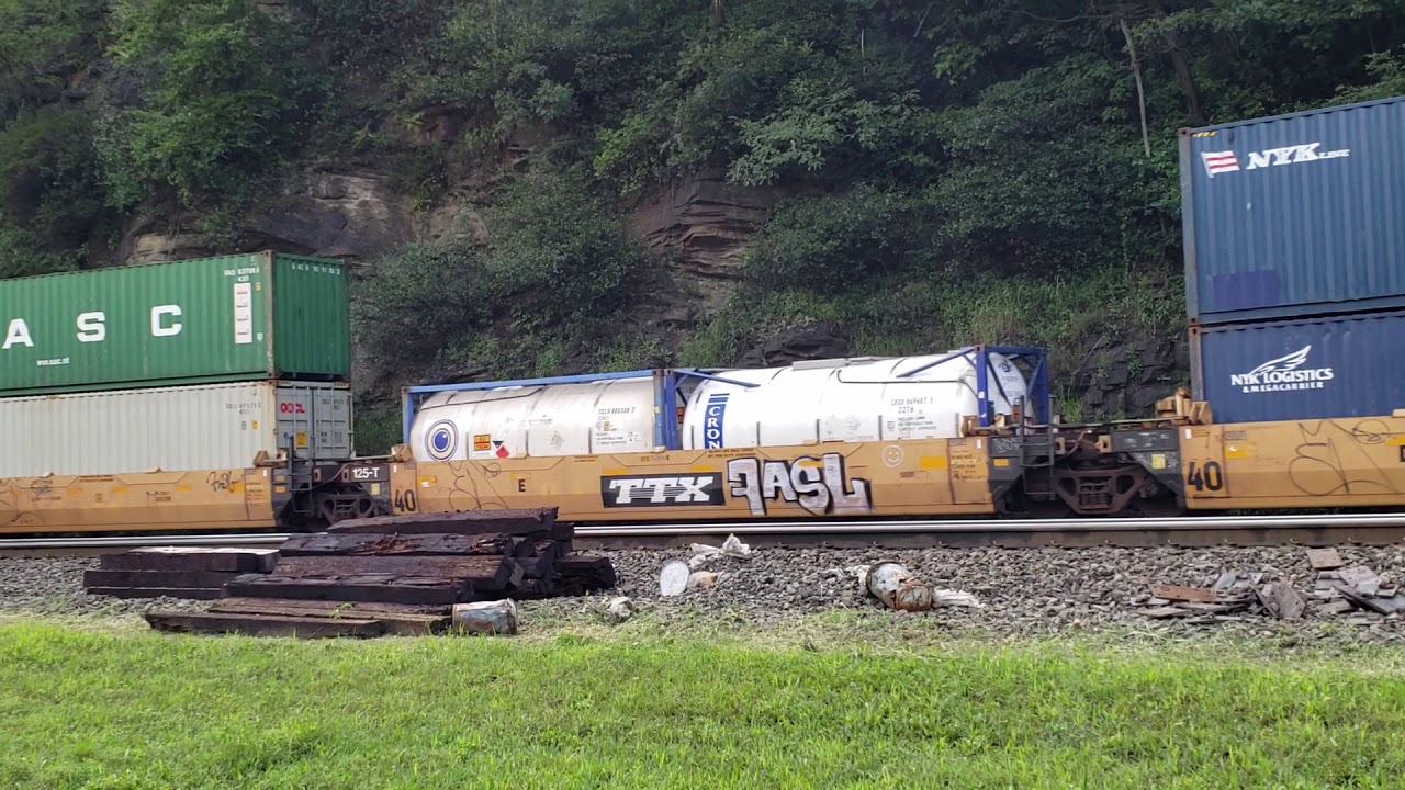 Very long train around the curve! - YouTube