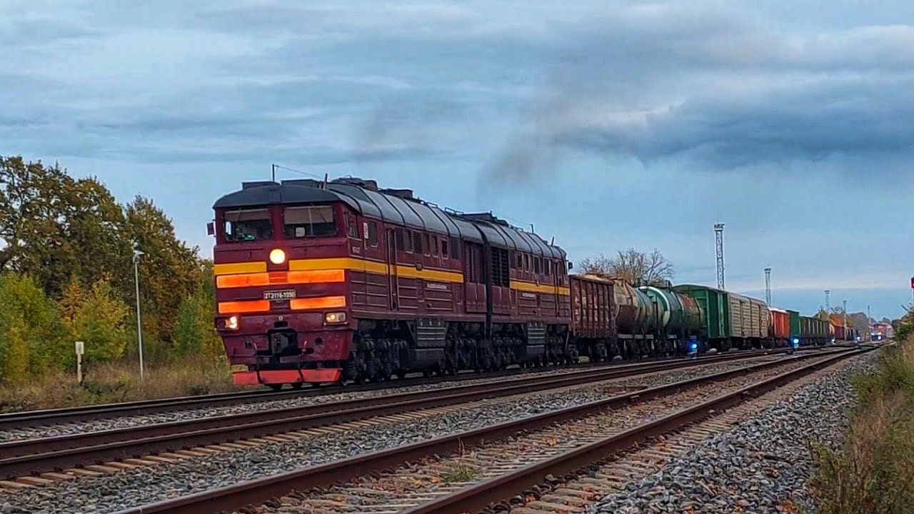 DMU's & freight train DR1AC-185+219 & 2TE116-1050 near from Krustpils ...