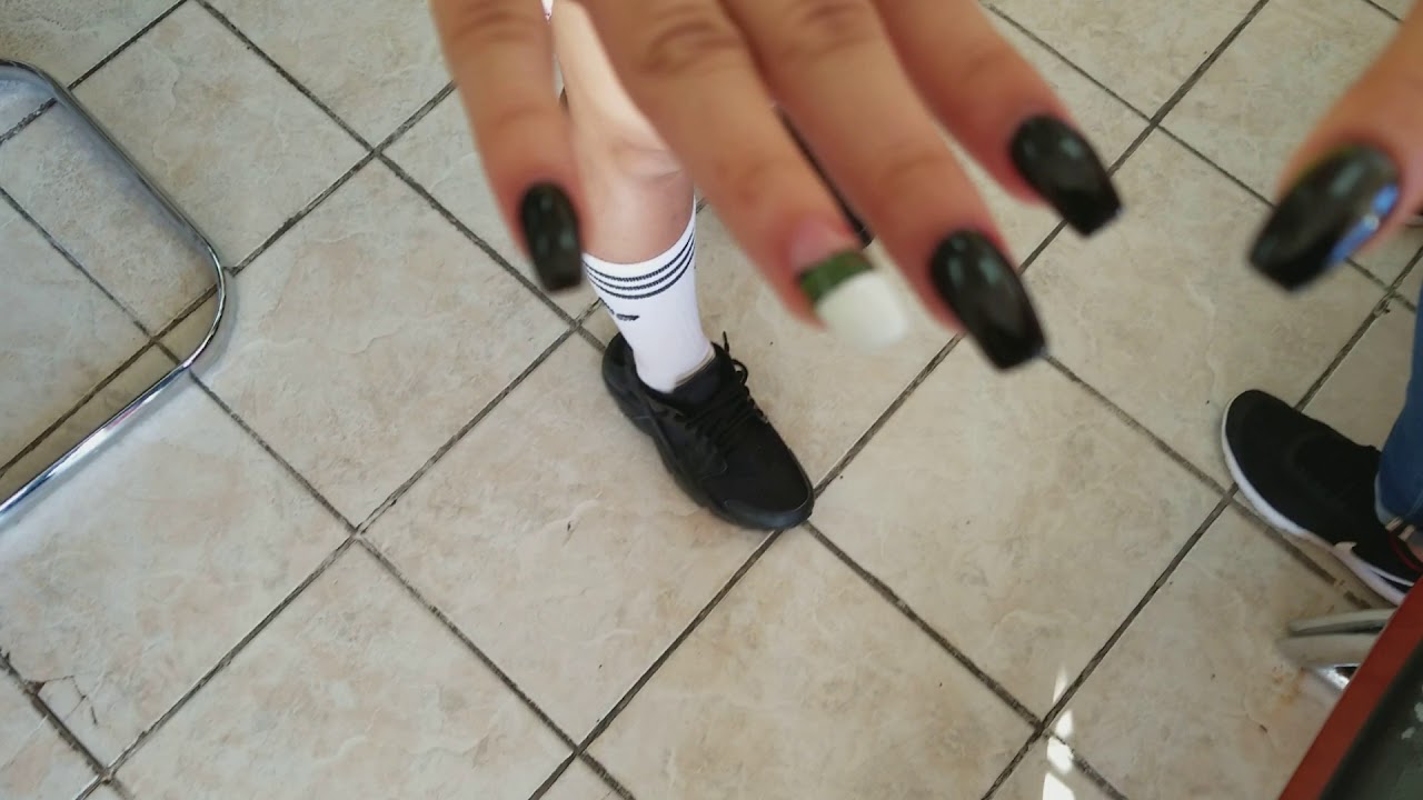 Damaris' nails done and ready at the CN nail spa in Rockville Maryland ...