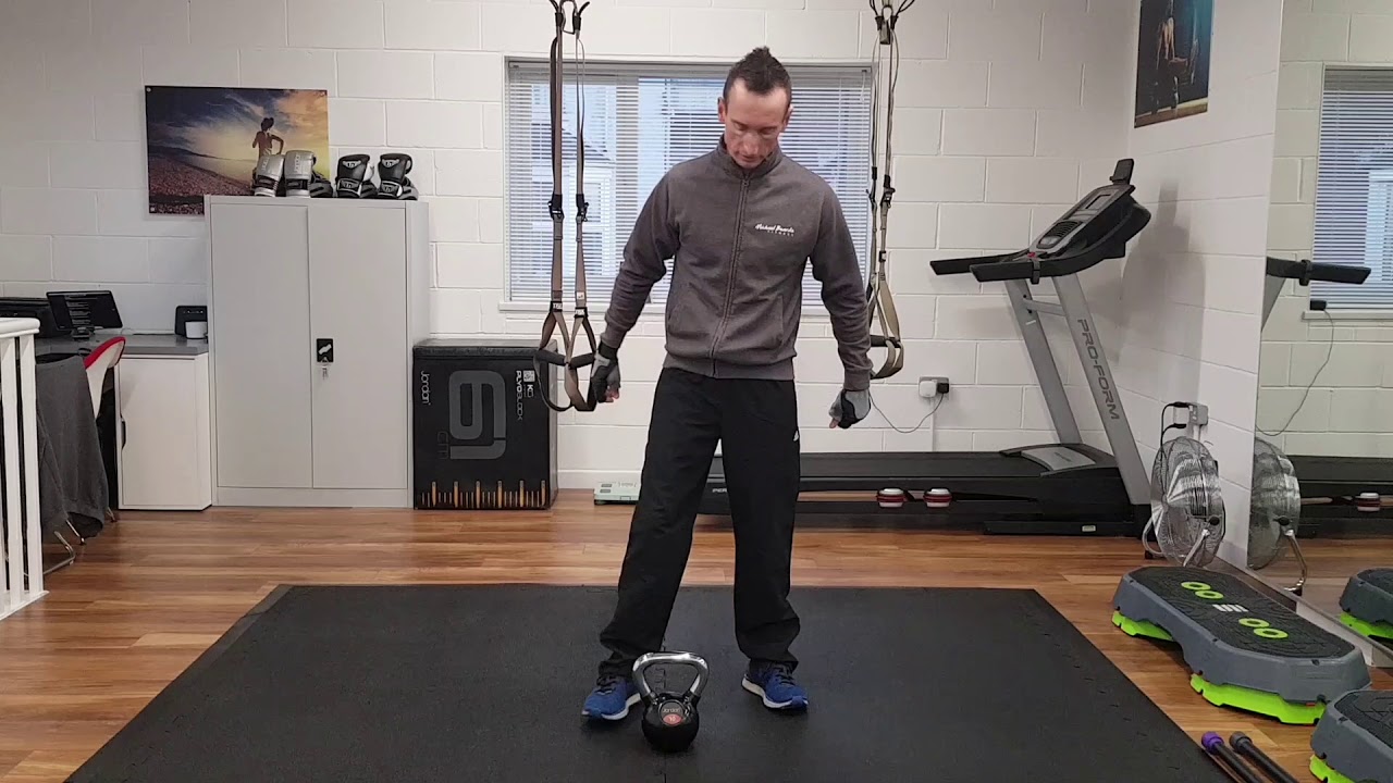Kettlebell squat into shoulder press - YouTube