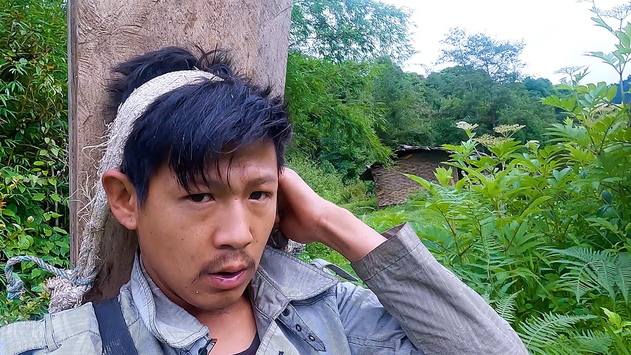 surya rai taking wood for house repairs || life in rural Nepal ...