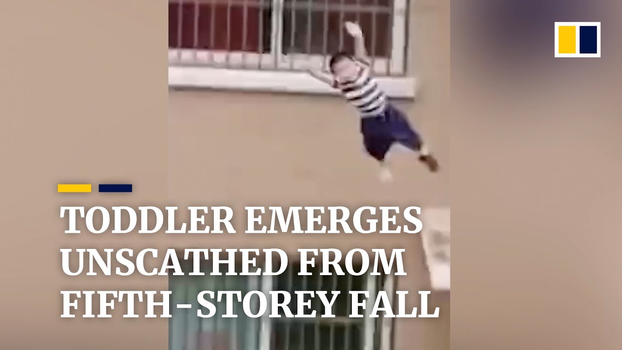 Toddler emerges unscathed from dramatic fifth-storey fall in China ...
