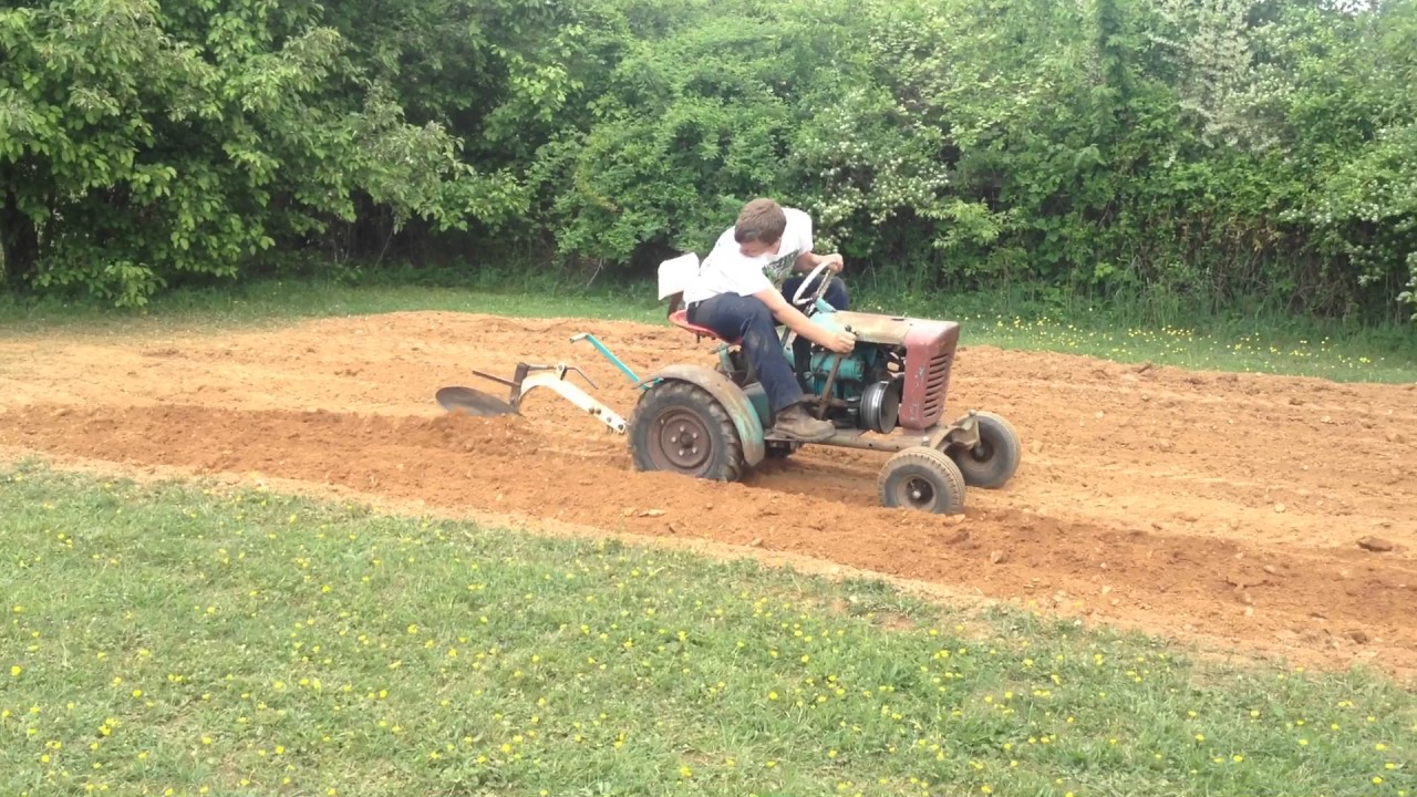 Panzer garden tractor plowing garden - YouTube