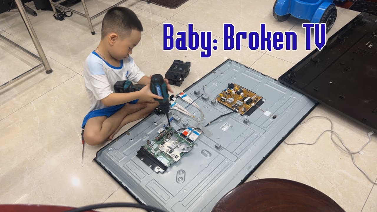 Baby smashes and opens the cover of the LG.| ANGRY BABY Smashing the TV ...