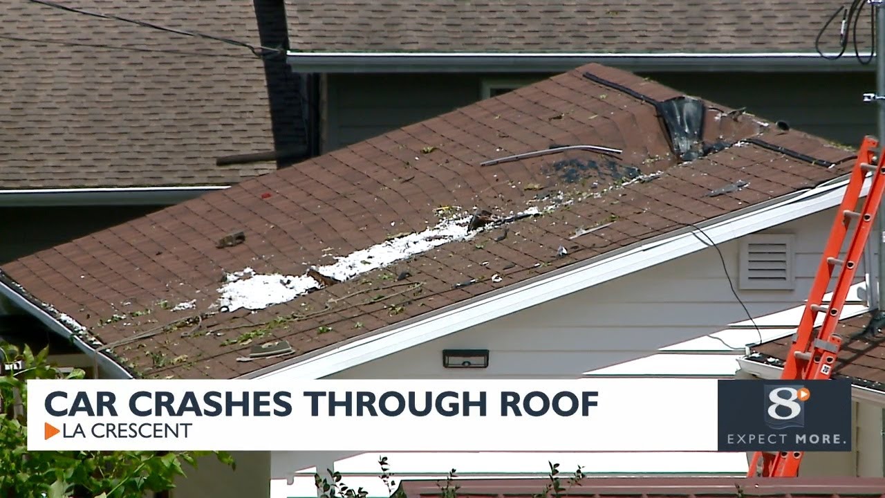 Car crashes through roof in La Crescent - YouTube