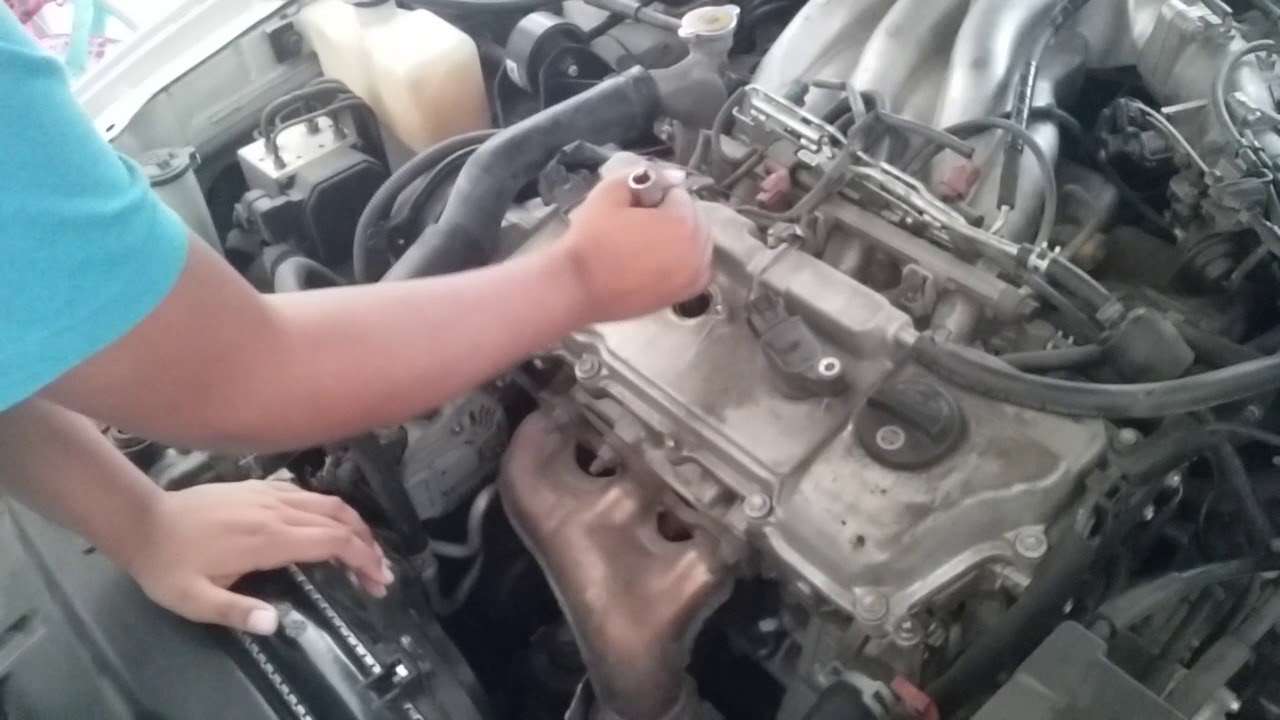 How to replace spark plug on 1999 Lexus - YouTube