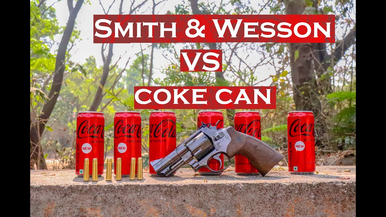 smith n wesson vs coke can test - YouTube