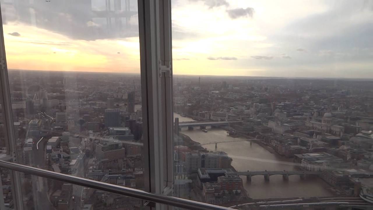 The view from the Shard London - plane fly over - YouTube