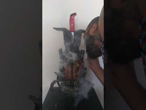 Charging Your Spirit Nganga With Cigar Smoke After Blood Feeding Video #2