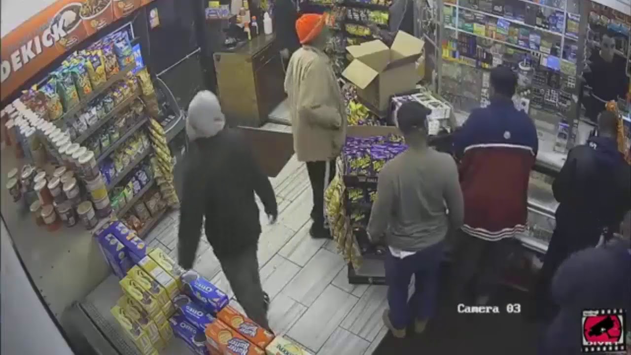 Surveillance video shows shootout inside a deli store - YouTube