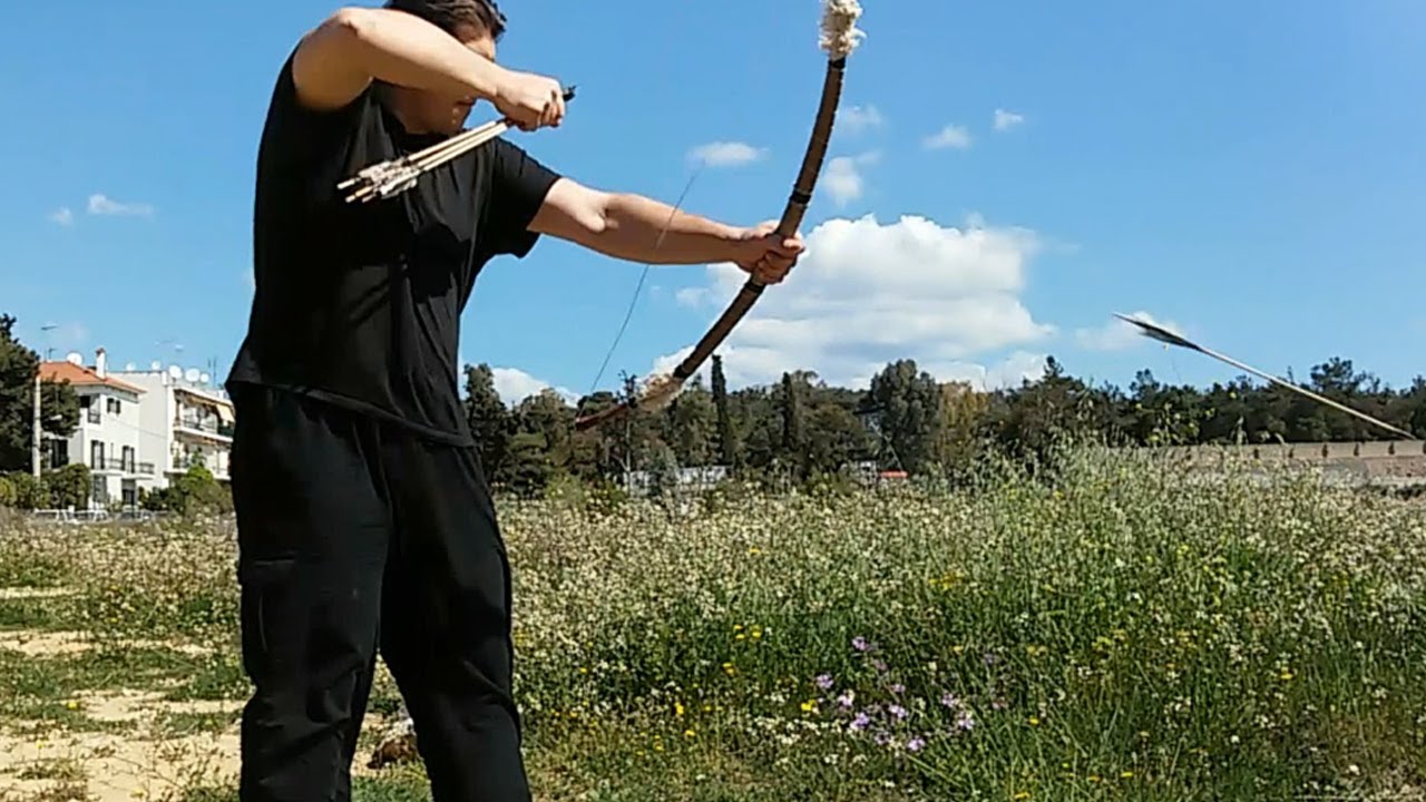 Holding and shooting arrows in a different way - YouTube