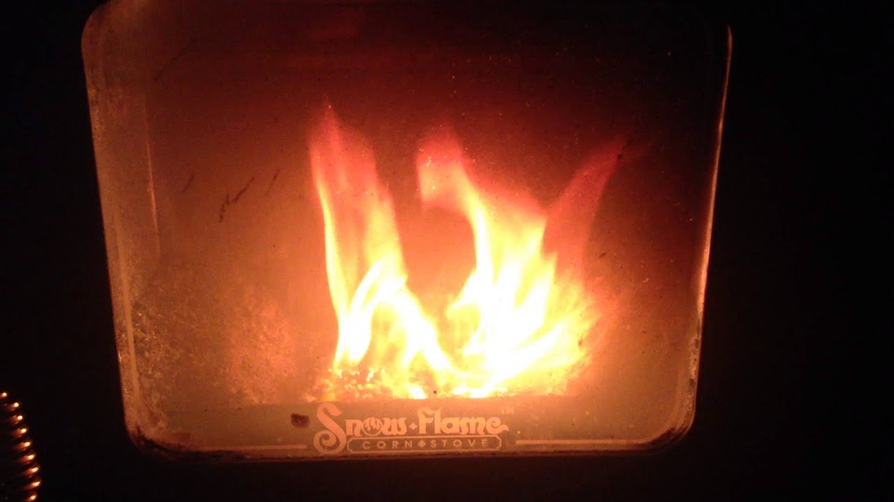 Burning Wheat in my Snow Flame heater - YouTube