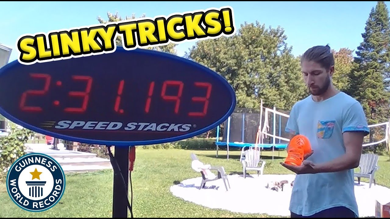 SLINKY TRICKS - Most hand-to-hand transfers of a slinky! - YouTube