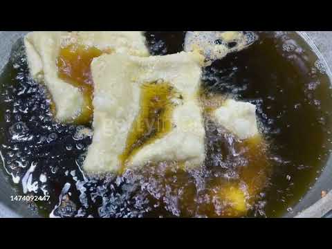 Close-Up Shot of Mughlai Paratha Frying – Authentic Bangladeshi Street Food.