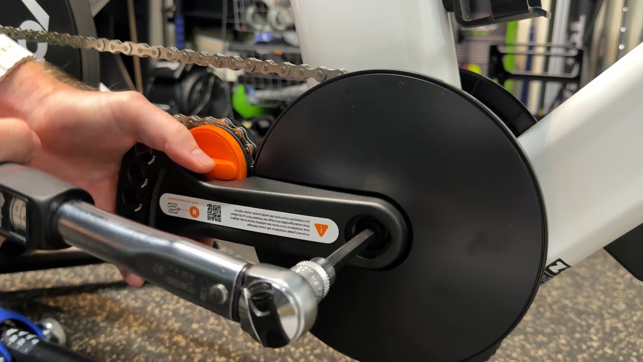 How to fit the adjustable crank arms to your Zwift Ride frame. - YouTube