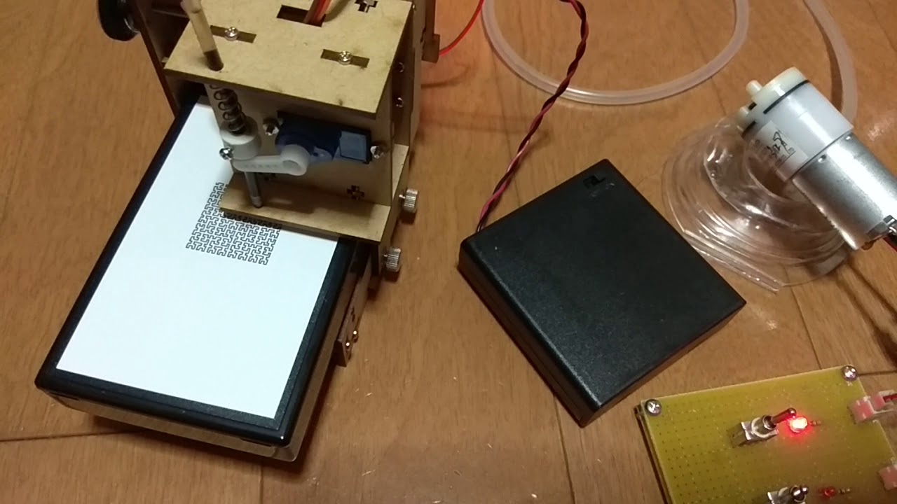 Palmtop size pen plotter with miniature vacuum table : to draw Hilbert ...