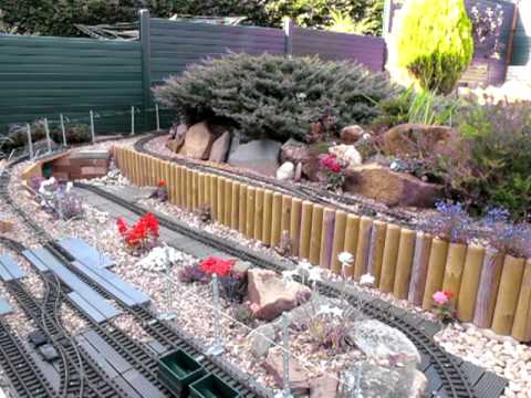 Small back garden LGB track - 3 trains running. - YouTube
