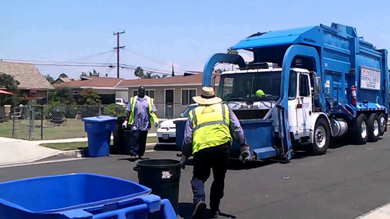 Consolidated disposal service front loader - YouTube