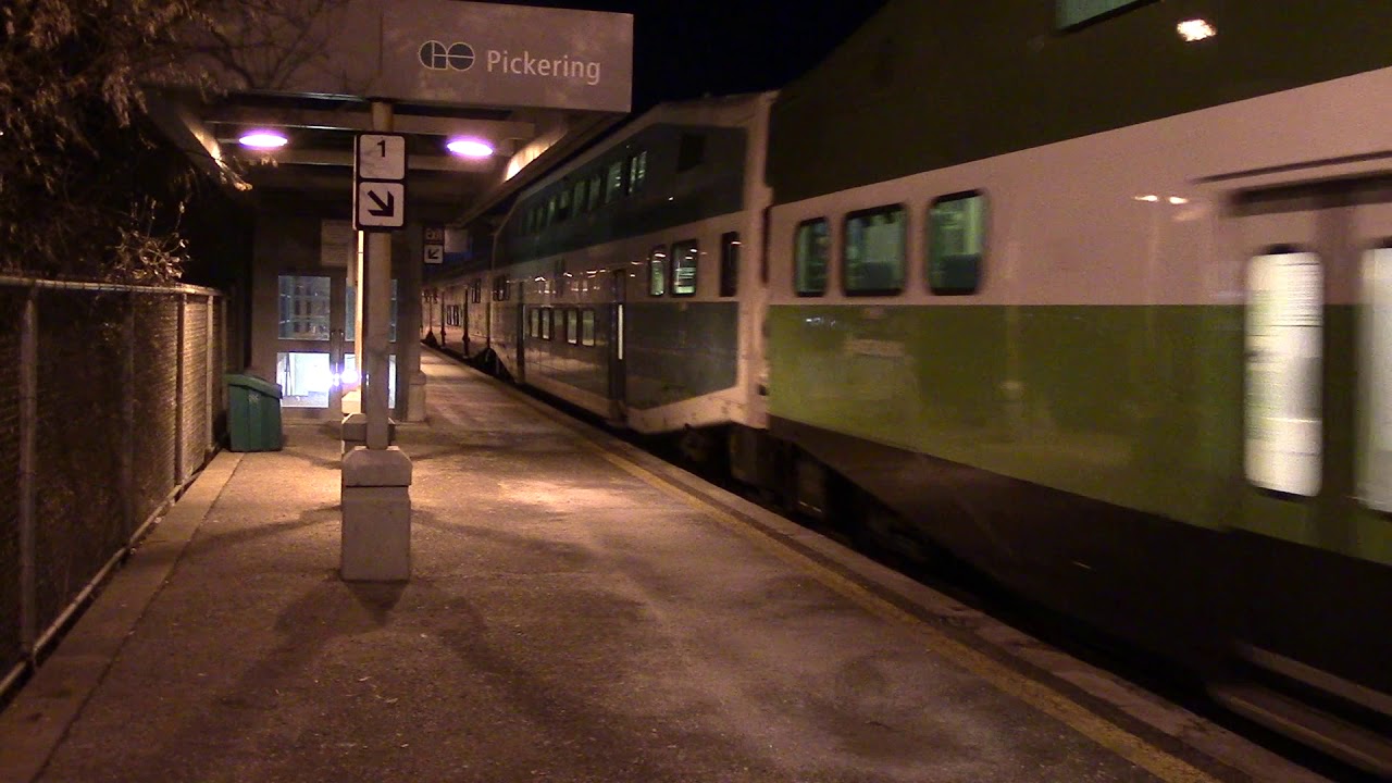 GO Transit trains meet at Pickering station. - YouTube
