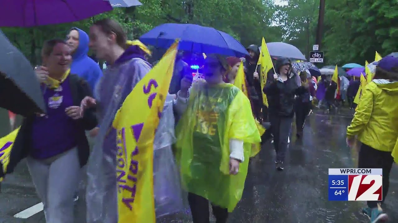 Butler Hospital workers strike through rain demanding better wages and ...