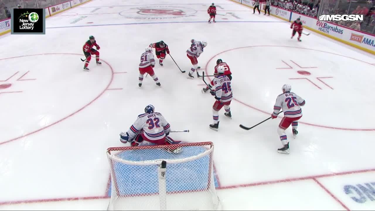 Brian Halonen scores a powerplay goal against the New York Rangers ...