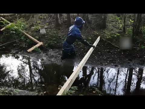 In deep mud in Hunter waders, rubber gloves and rainwear - Building a ...