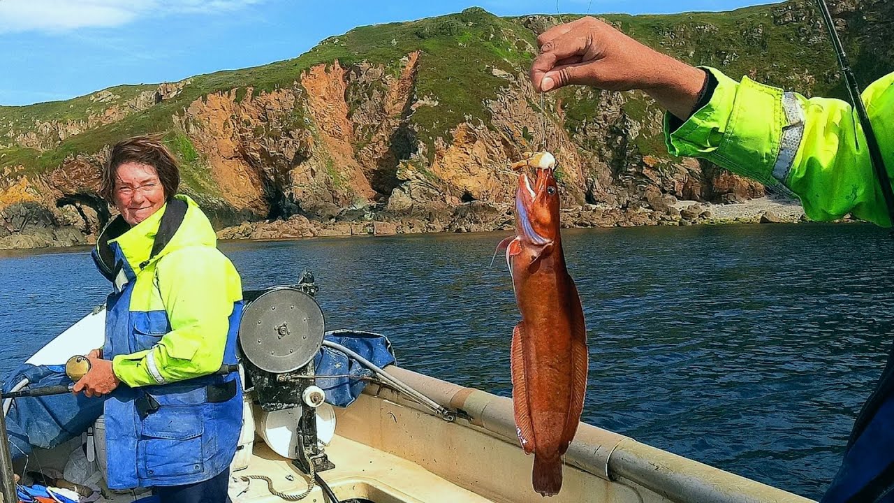 Fishing Wrasse Rockling With A Scenic View Along South Coast Cliffs ...