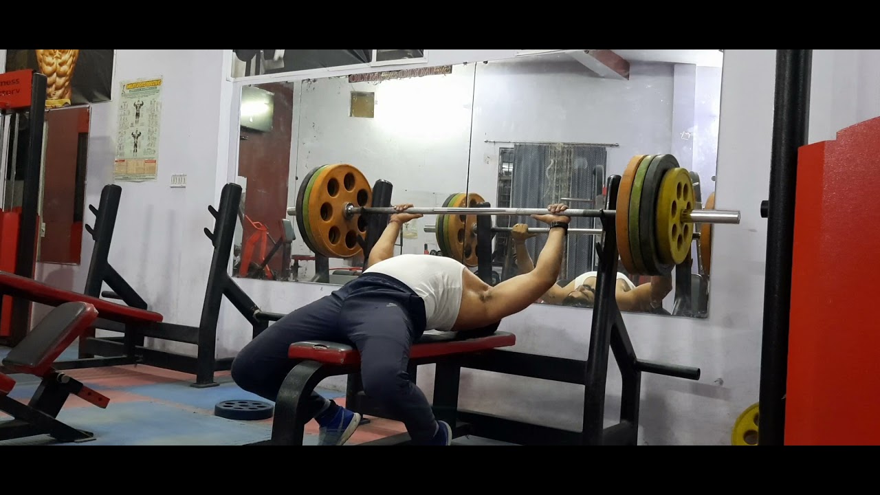 140 kg bench press. heavy bench press. pumping chest muscle with heavy ...