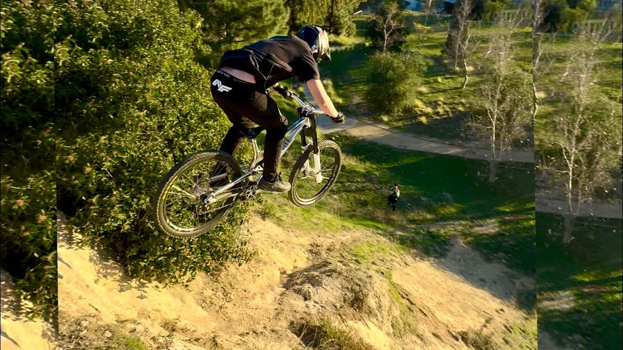 Building a huge mtb drop in a park - YouTube