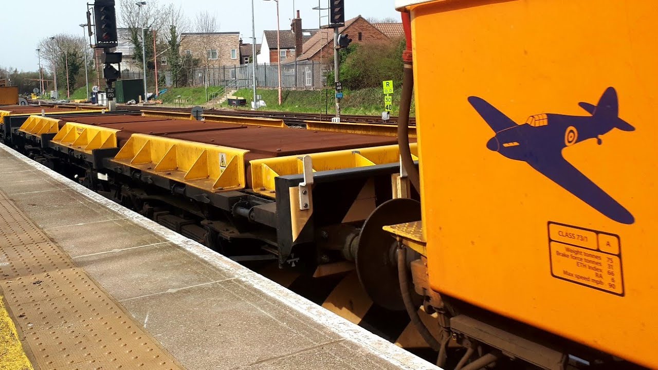 ED's 73136 + 73109 haul small snowplough & SITT wagons into and out of ...